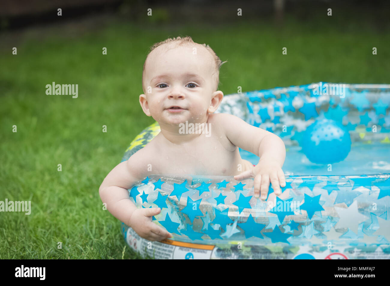 Small toddler looking water hi-res stock photography and images - Alamy