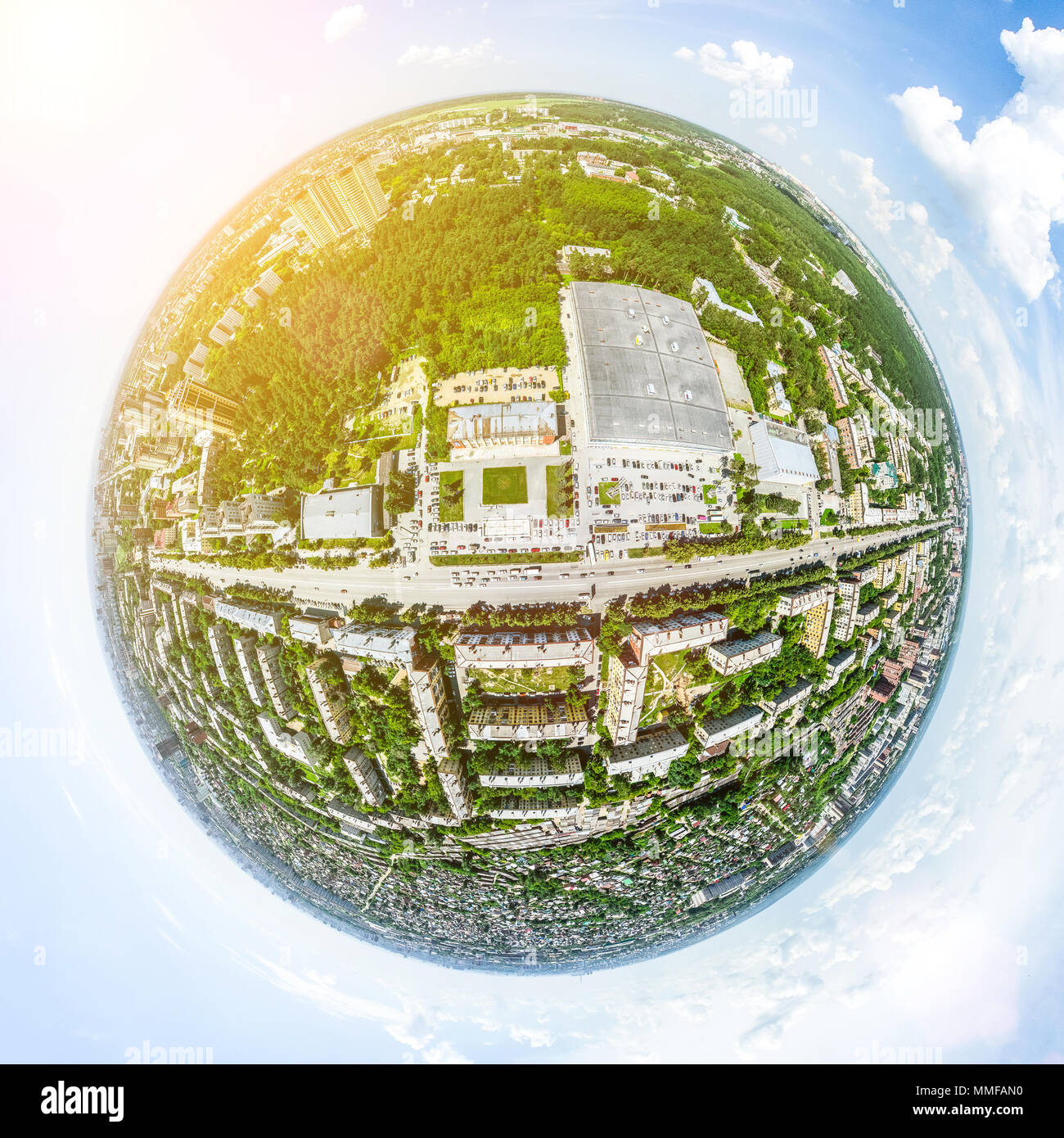 Aerial city view with crossroads and roads, houses, buildings, parks ...