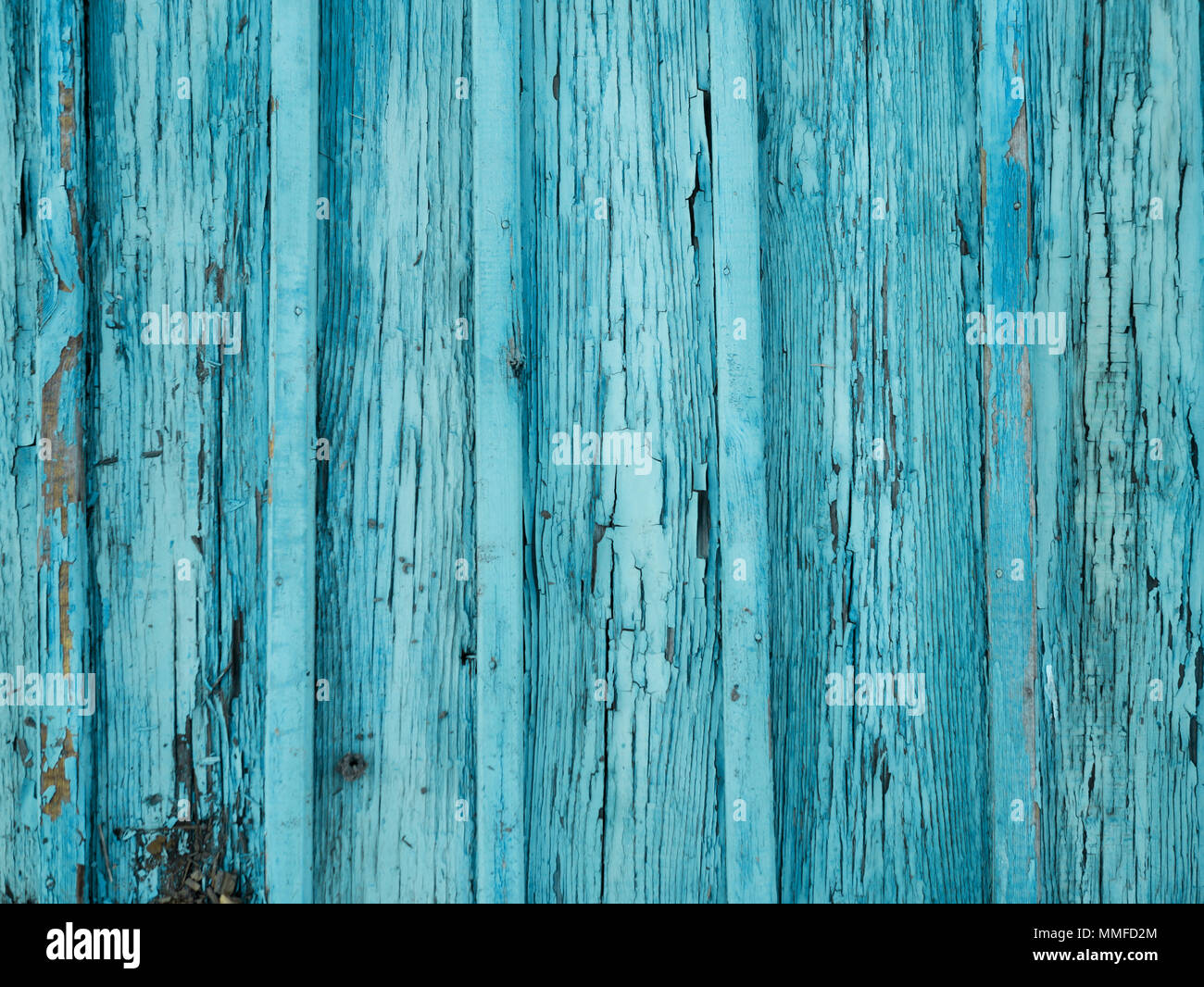 Painted pastel turquoise wood surface, with an abstract expressive ...