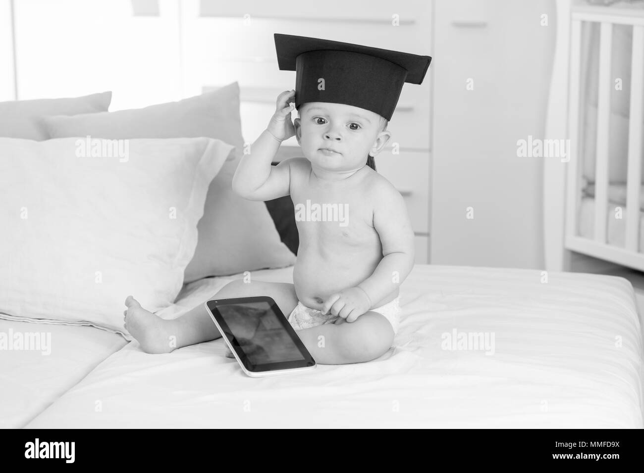 Baby graduation hat Black and White Stock Photos & Images - Alamy