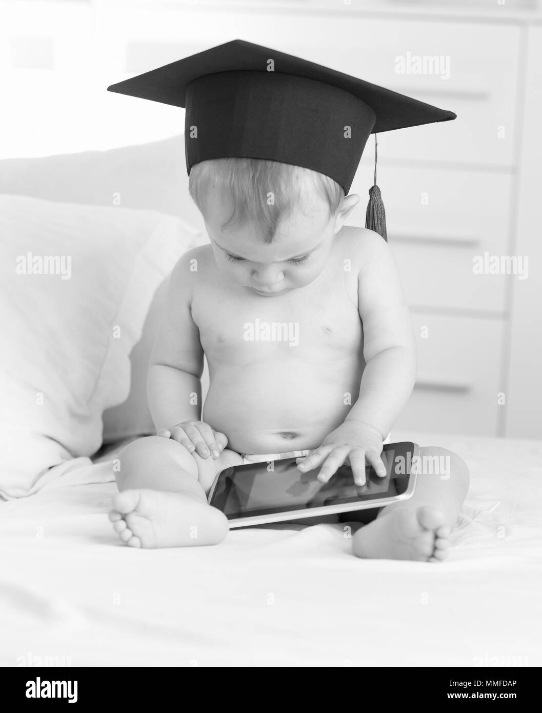 Baby graduation hat Black and White Stock Photos & Images - Alamy