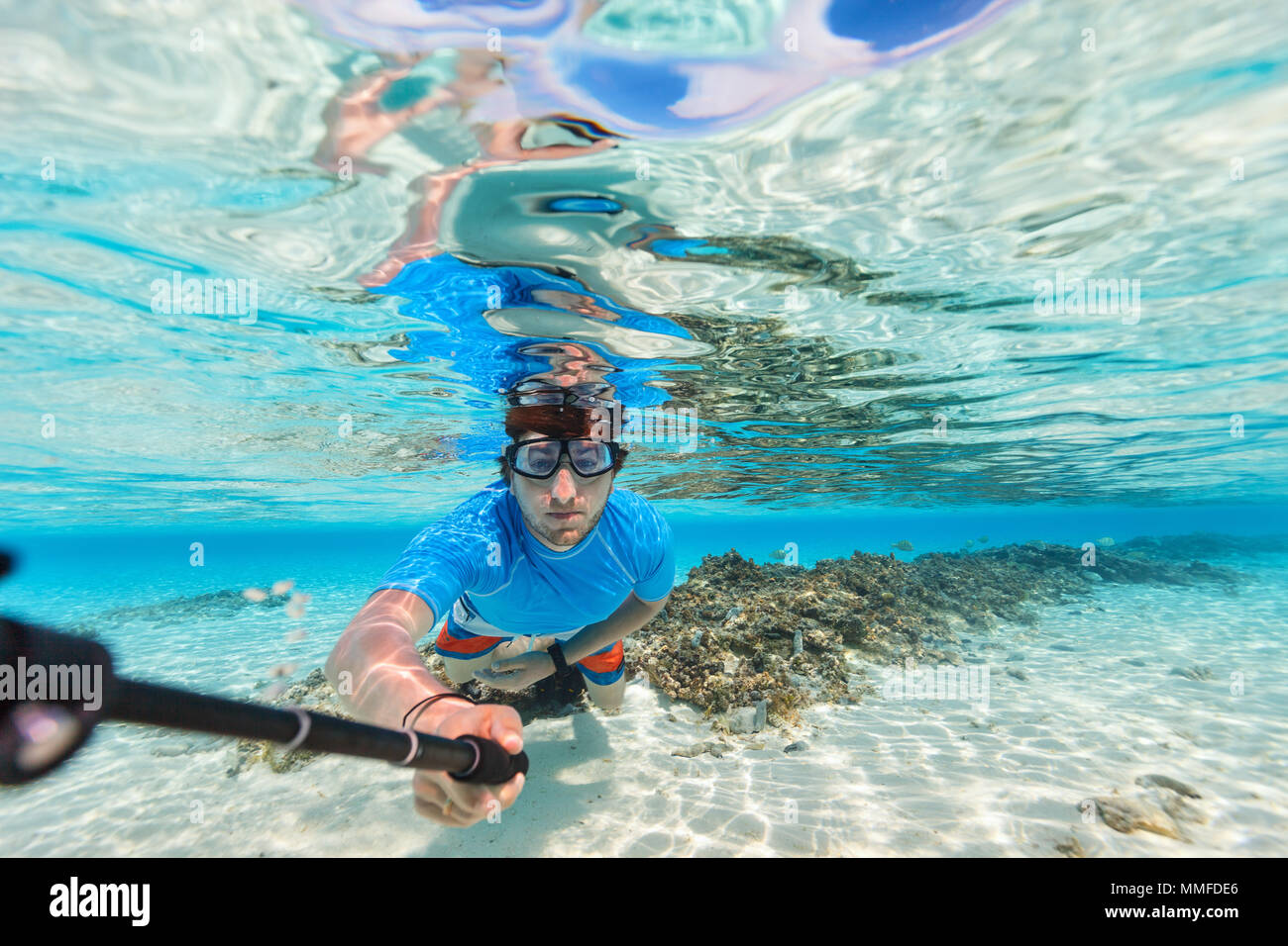 Underwater photo of a young man diving Stock Photo - Alamy