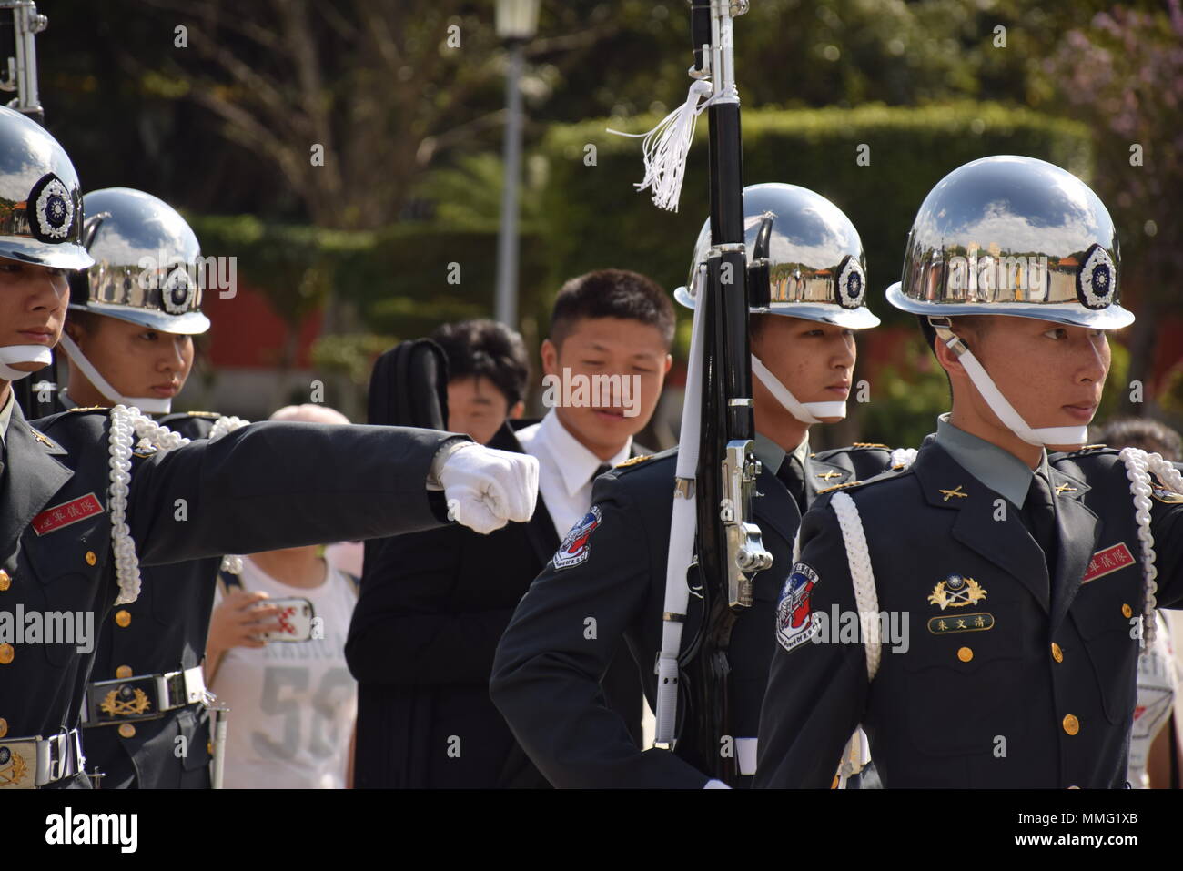 Military officers during the changing of the guard inside the National Revolutionary Martyrs ...