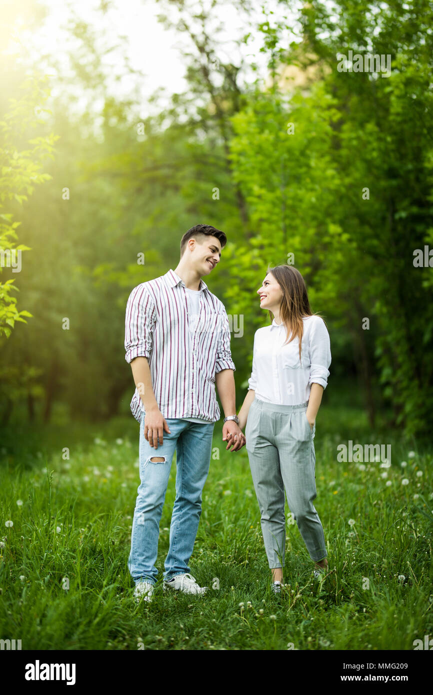 Portrait of a happy couple walking together outdoors Stock Photo - Alamy