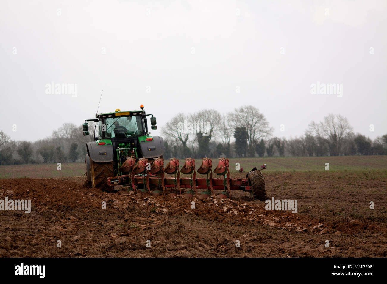 Tractor Ploughing Field Stock Photo - Alamy