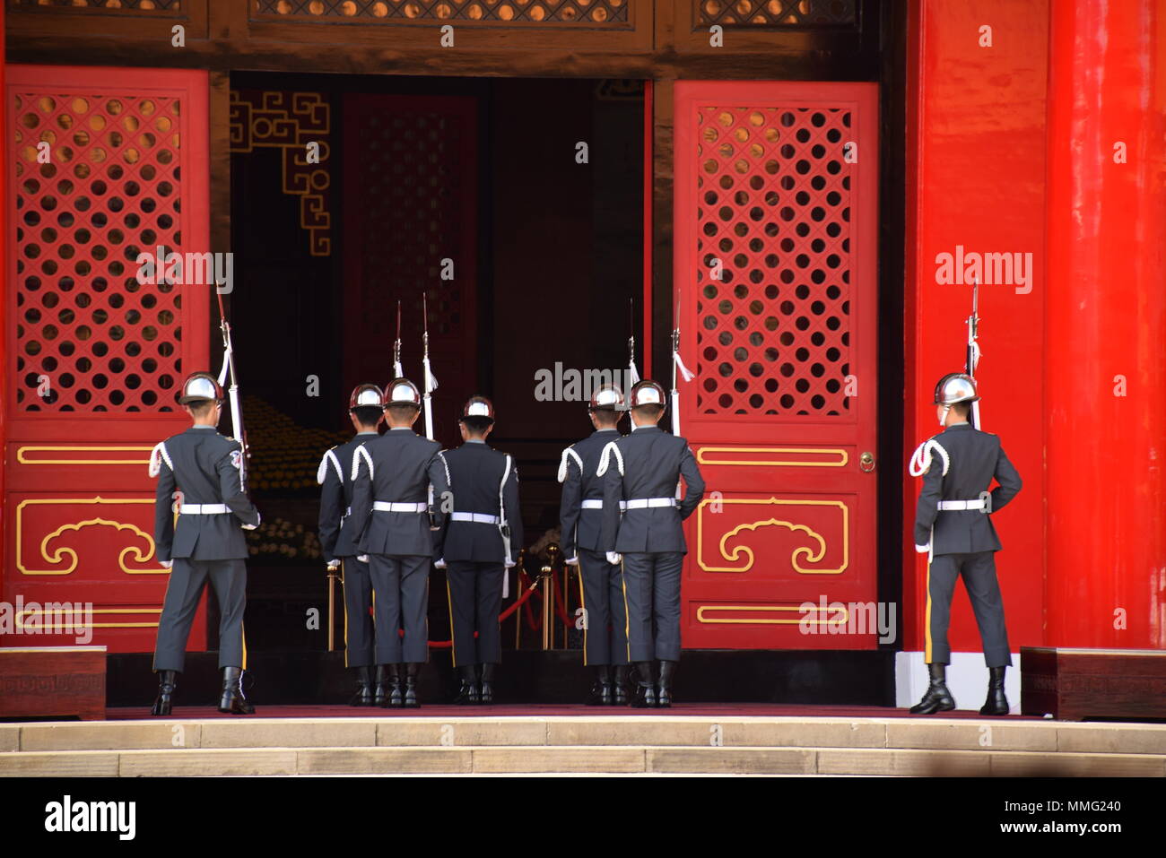 Military officers during the changing of the guard inside the National Revolutionary Martyrs ...
