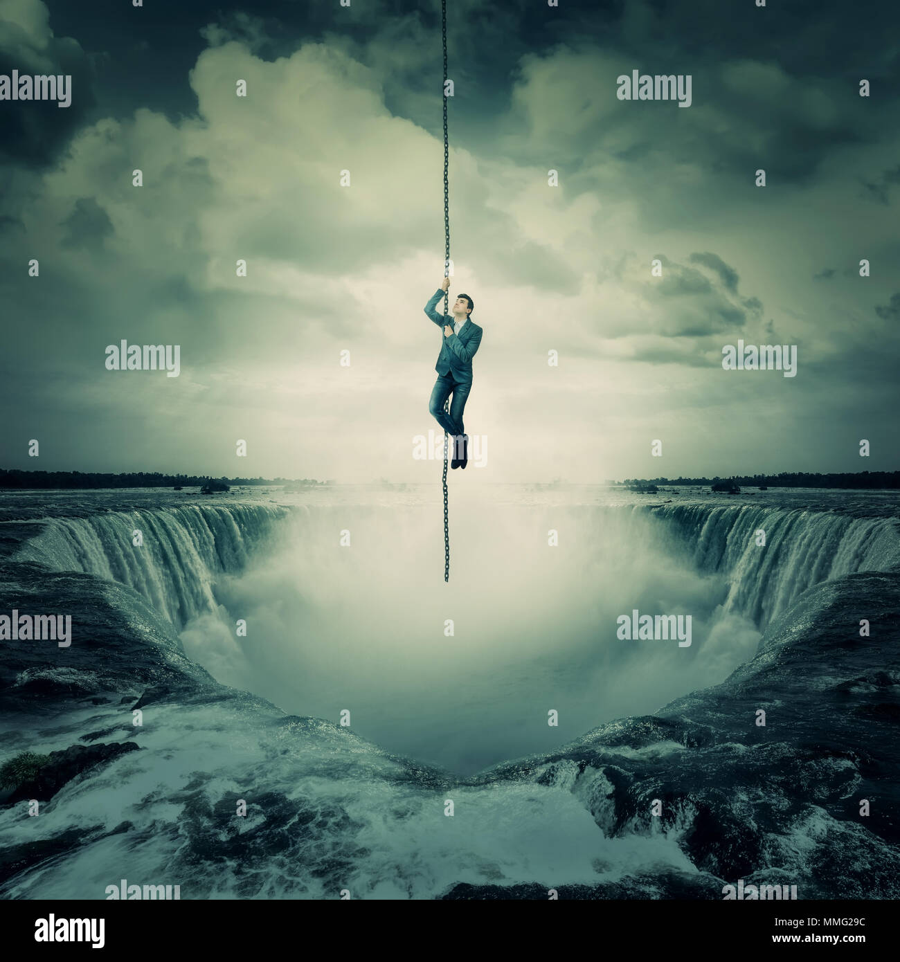 Businessman salvation, surviving the storm buiness concept as a scared ...