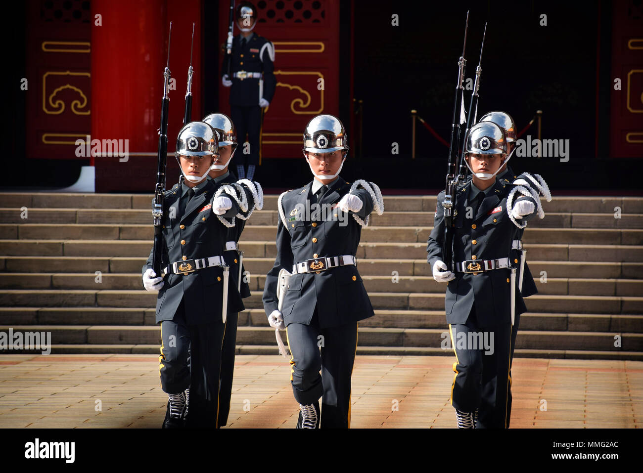 Military officers during the changing of the guard inside the National Revolutionary Martyrs ...