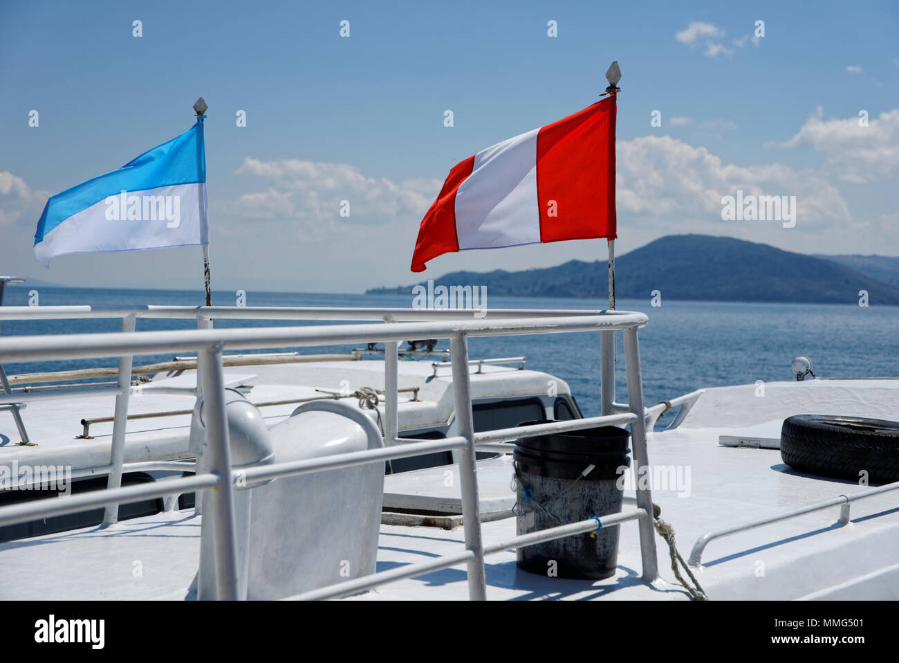 Boat ride with Waving Flag Stock Photo - Alamy