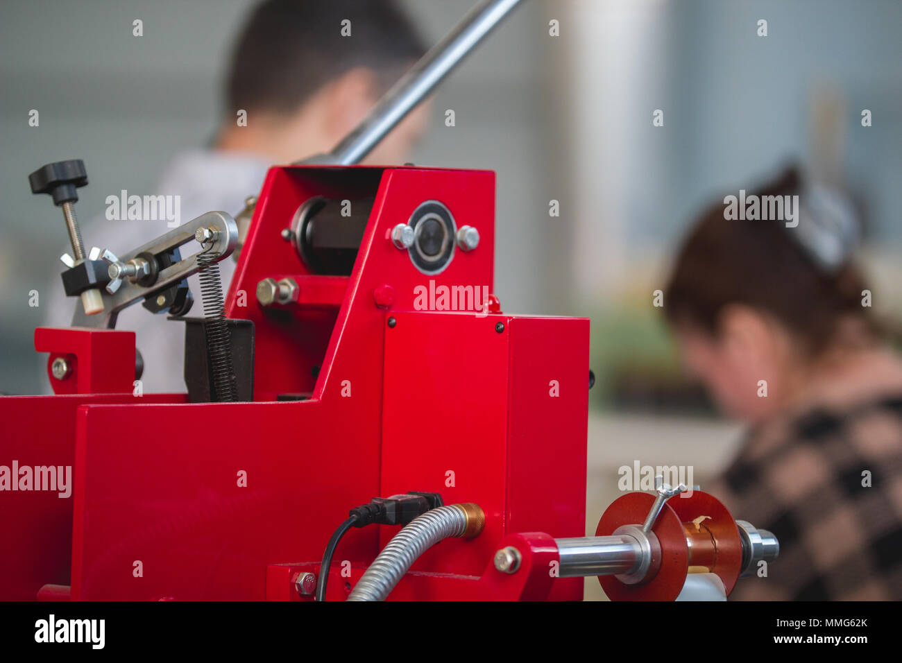 A modern metallic machine at the printing house Stock Photo - Alamy