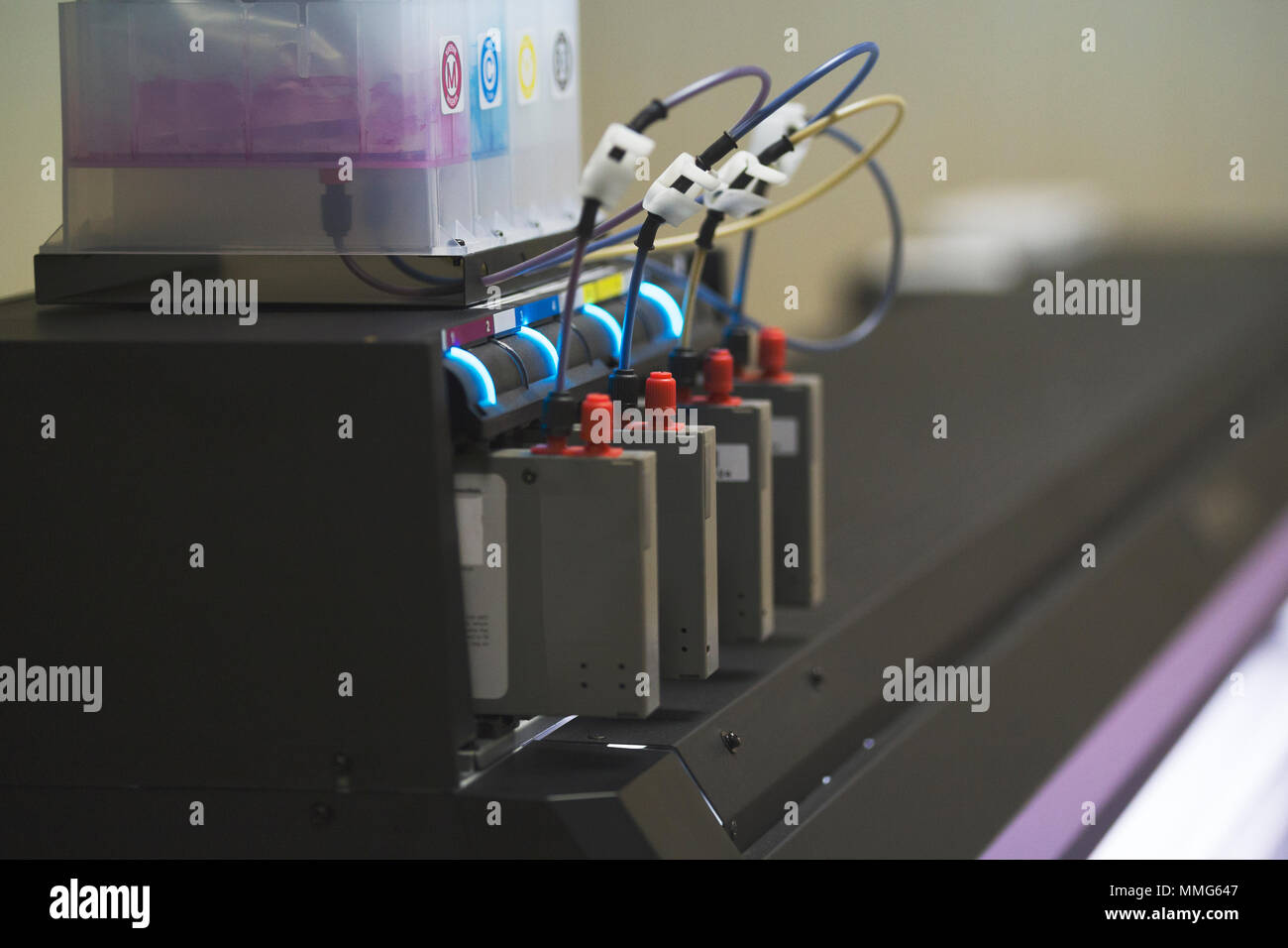 Color ink cartridges inside professional printer in typography Stock ...