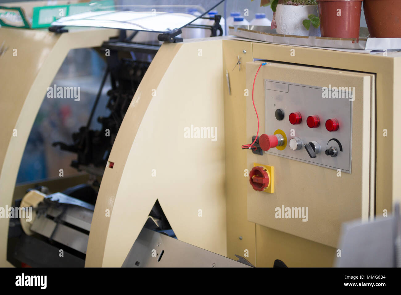 Control panel of the print press machine with buttons at printing ...