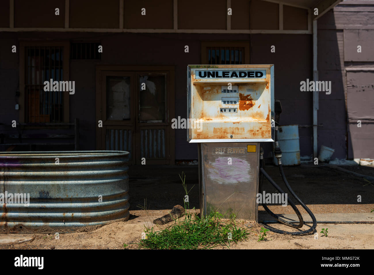 Old and rusty fuel pump in an abandoned gas station in the USA; Concept ...