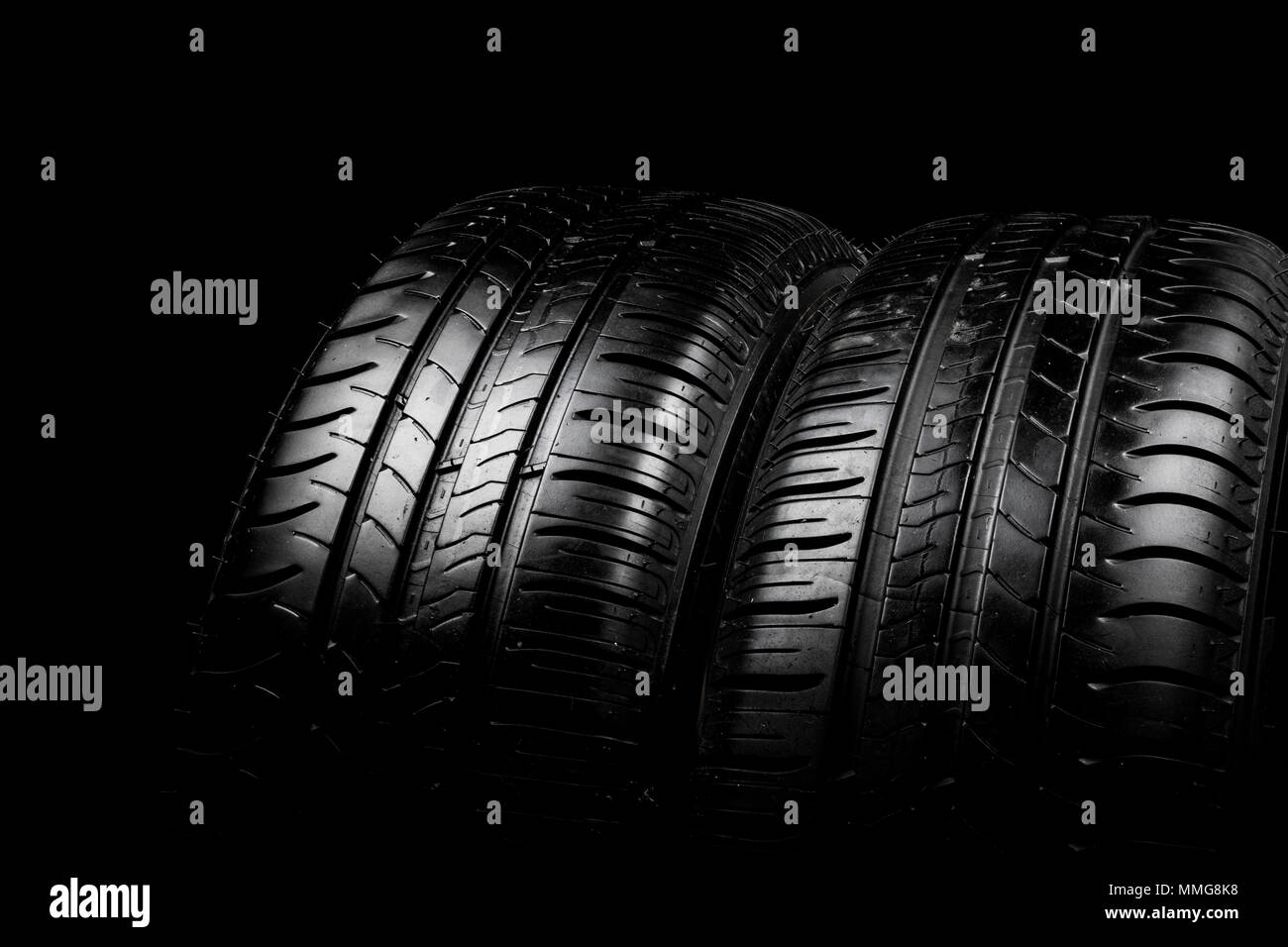 Close up view of a car tyre isolated on a black background Stock Photo ...