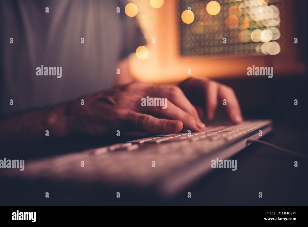Hands type computer keyboard. Man using desktop pc in home office low ...