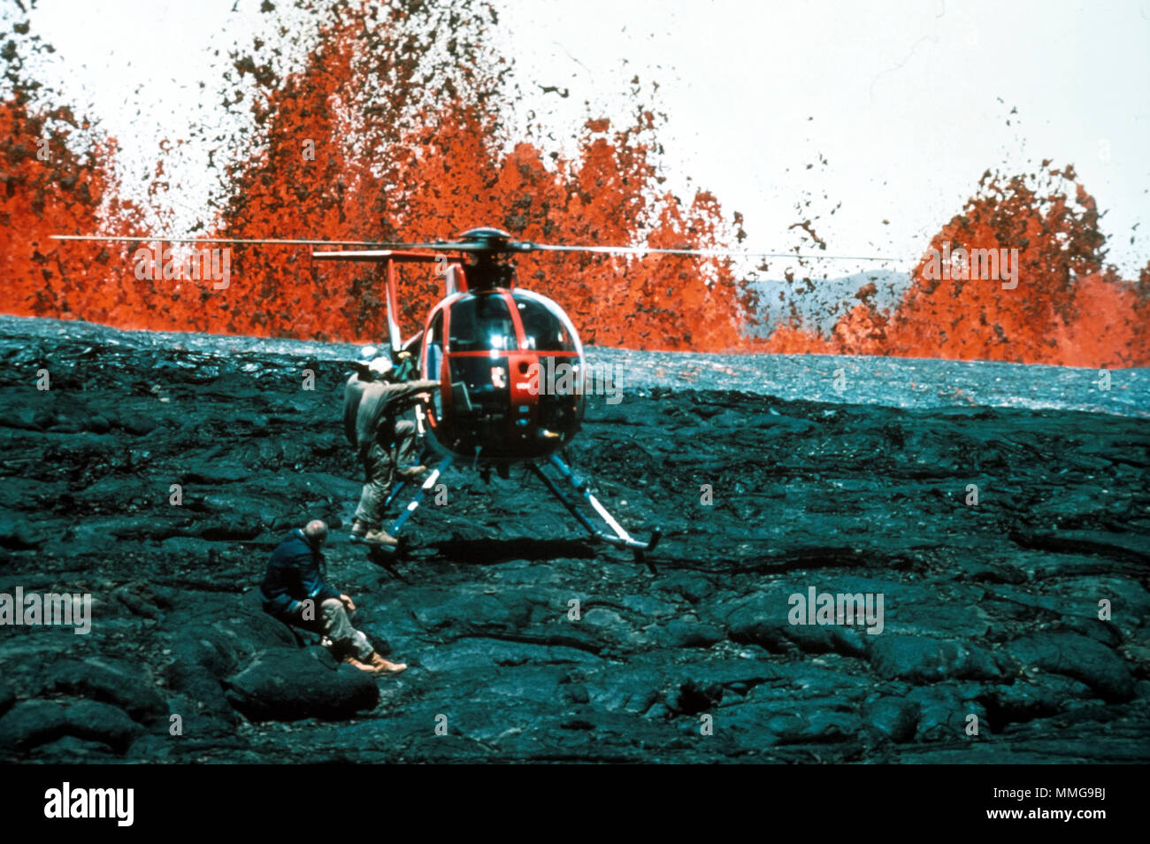 Hawaii volcano eruption helicopter on lava flow Stock Photo - Alamy