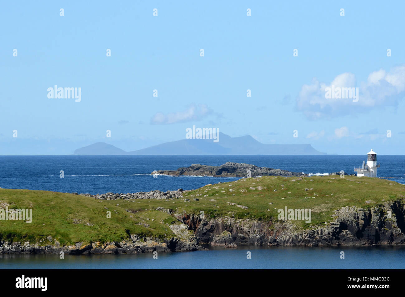 The island of Foula viewed from Burra on the mainland of Shetland on a ...