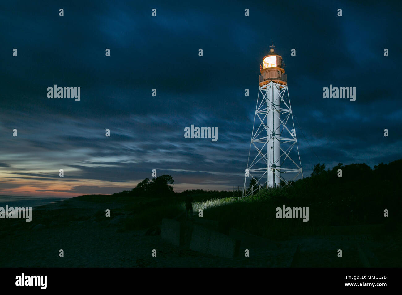 Lighthouse at night Stock Photo - Alamy