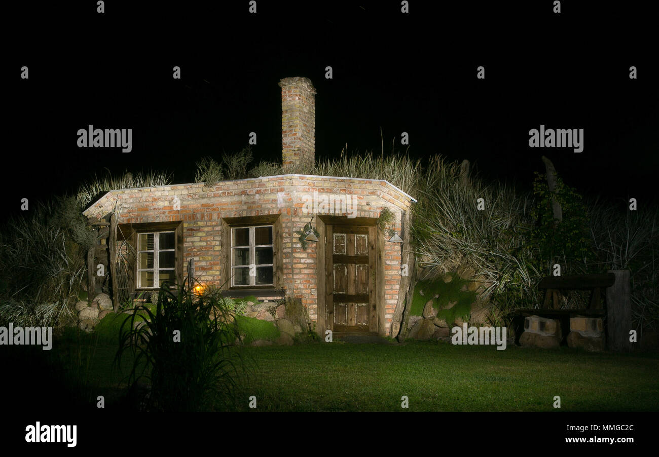 Magic brick hut at night Stock Photo - Alamy