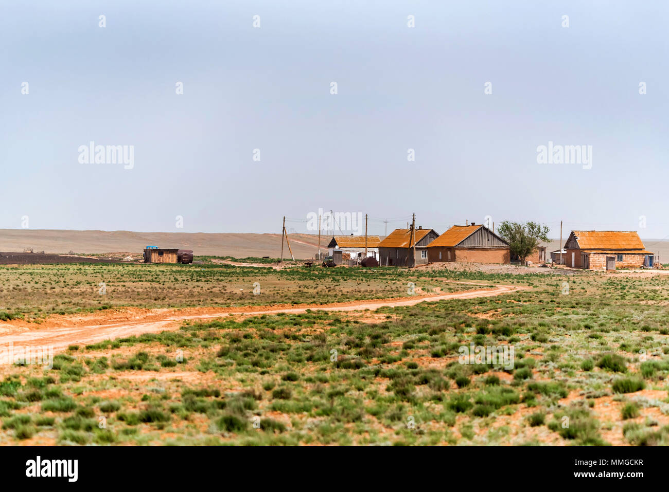 Several farm houses in semi-desert Stock Photo - Alamy
