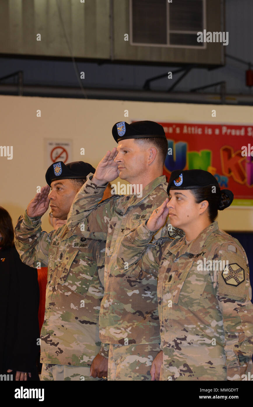 From left, outgoing Command Sgt. Maj. William Majors, Col. Kurt Connell ...