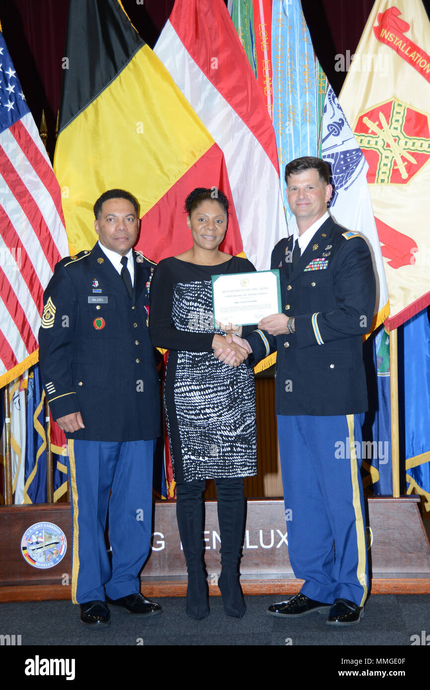 Laura D. Majors, Command Sgt. Maj. William Majors' wife, receives a ...