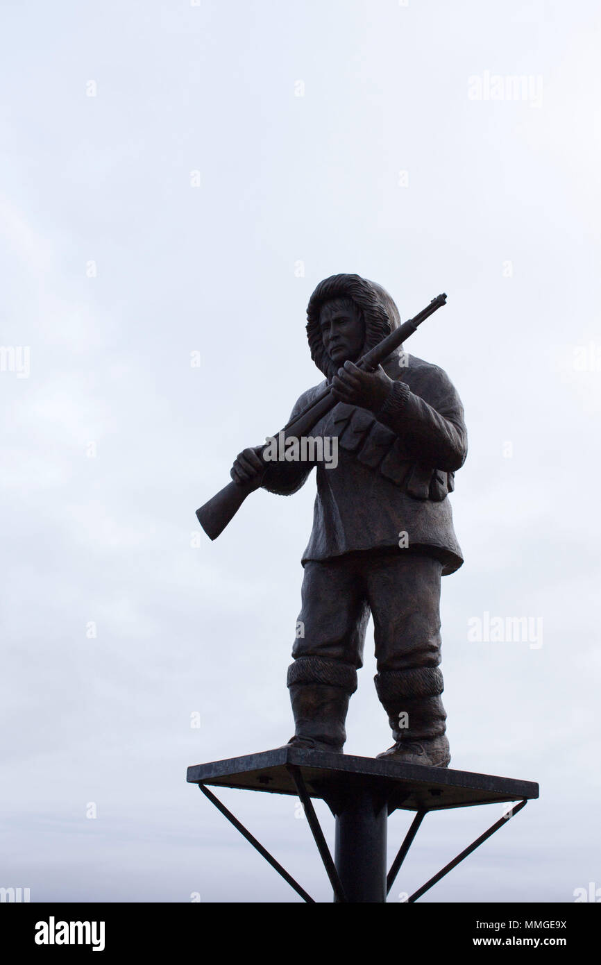 A bronze statute stands, ever watchful, on a steel pedestal at the ...