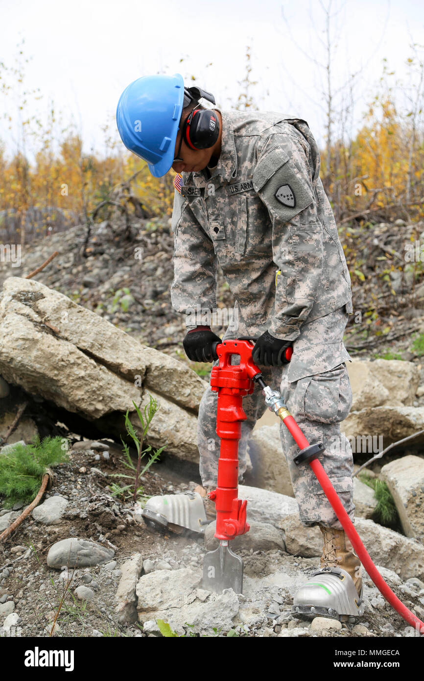 Alaska Army National Guard Spc. Chin Saefong, a plumber with the 207th ...