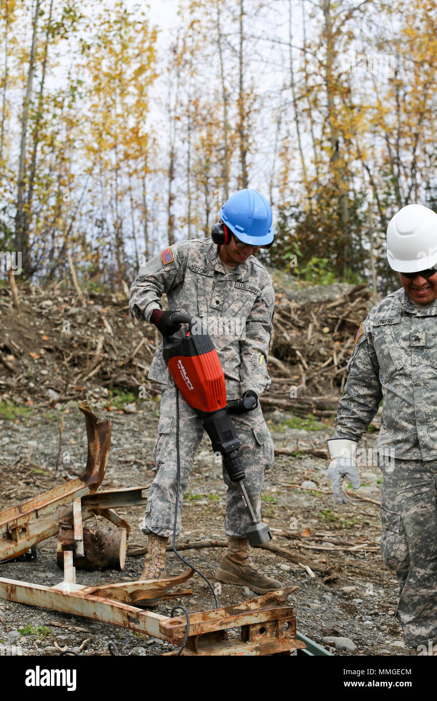 Alaska Army National Guard Spc. Chin Saefong, a plumber with the 207th ...
