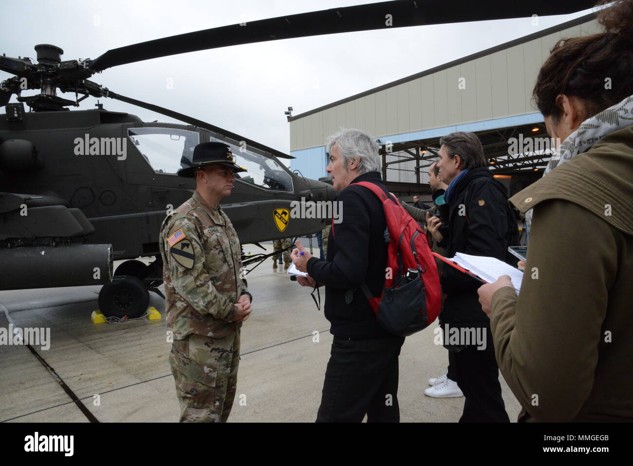 Belgian journalists interview Army Col. Cain Baker, commander of the ...