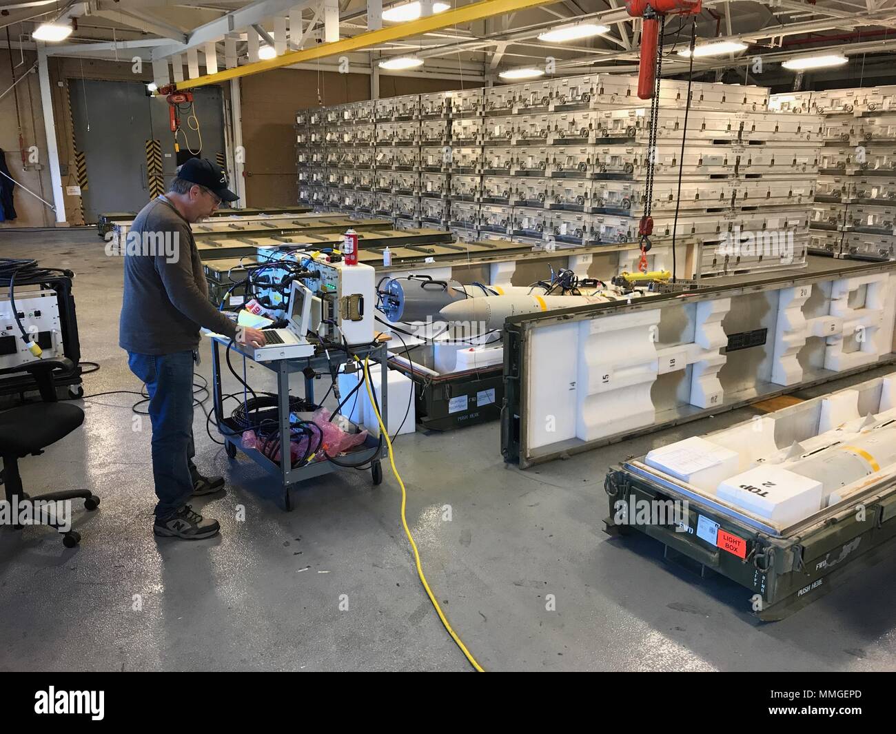 A Letterkenny Munitions Center technician performs testing on an ...
