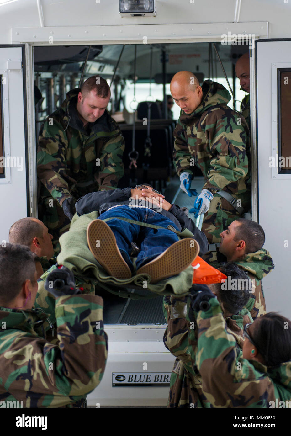 Airmen from the 446th Aeromedical Staging Squadron, load a mock patient ...