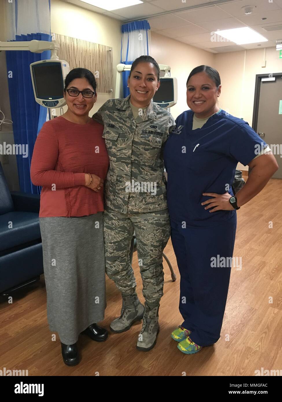 Staff Sergeant Cinnamon Kava (center), 60th Logistics Readiness ...