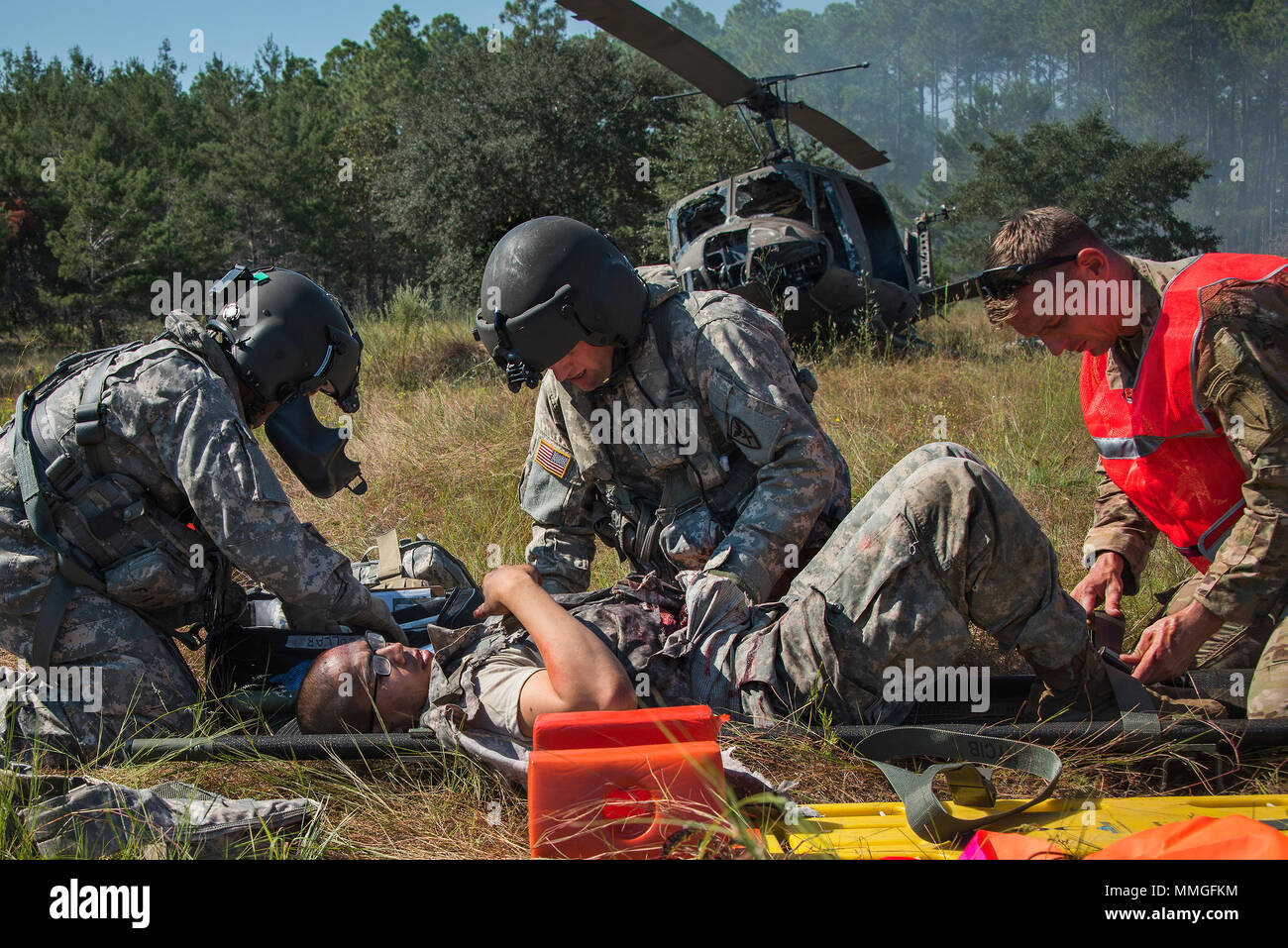 U.S. Army 6th Ranger Training Battalion members assess and stabilize a ...