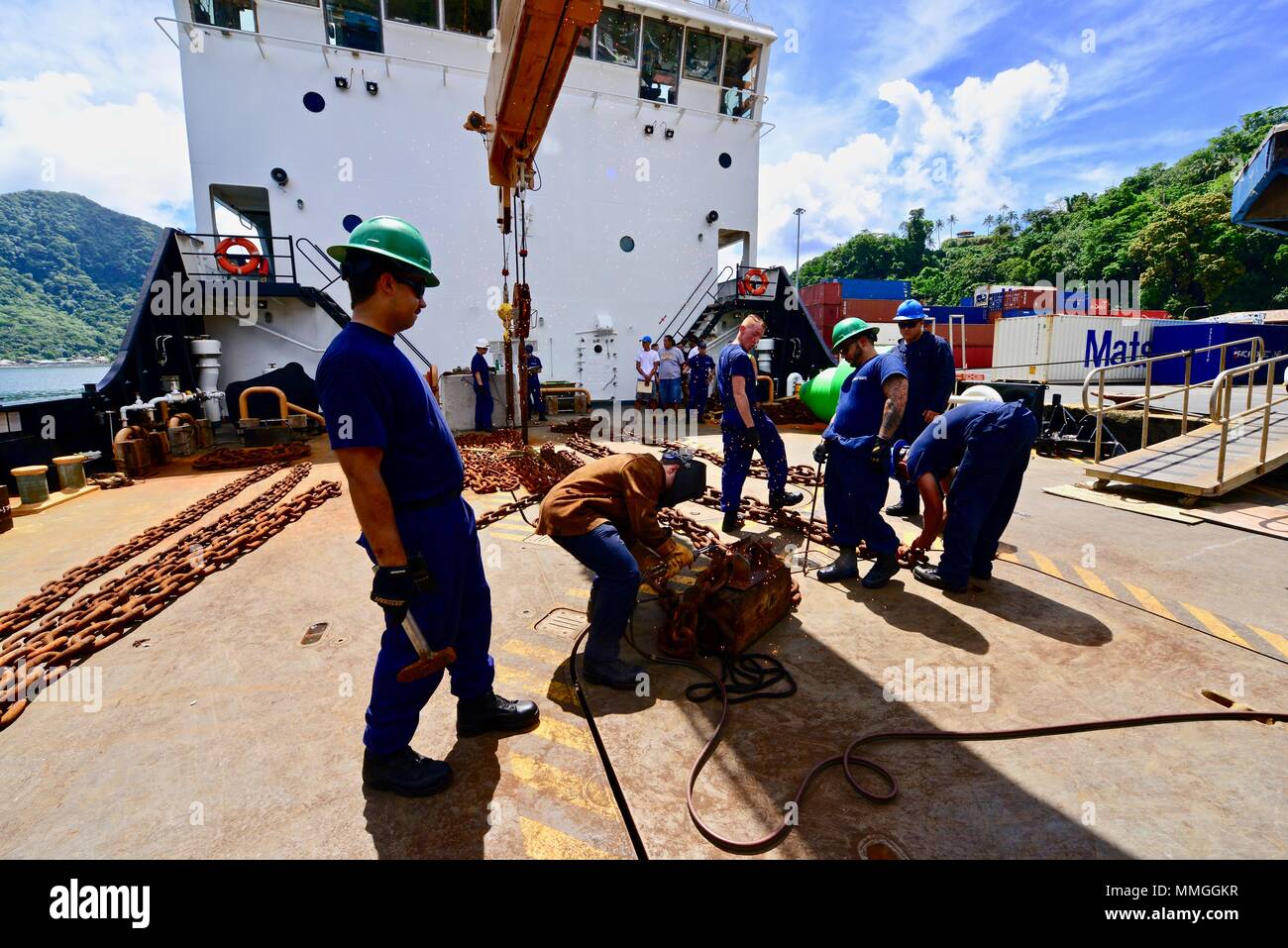 The crew of the USCGC Walnut (WLB 205) prepares shots of chain while ...