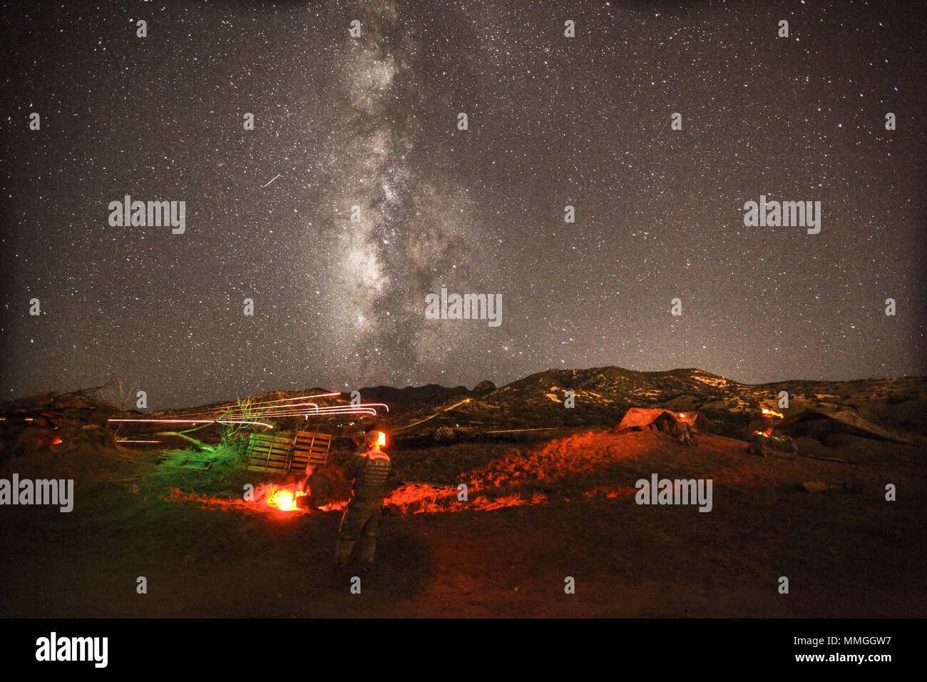 Alpha Company, 40th Expeditionary Signal Battalion conducts a live fire ...