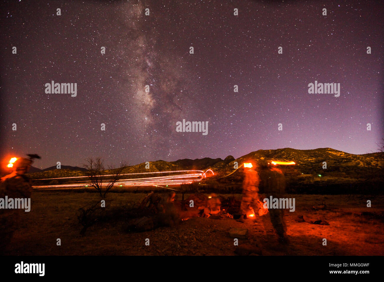 Alpha Company, 40th Expeditionary Signal Battalion conducts a live fire ...