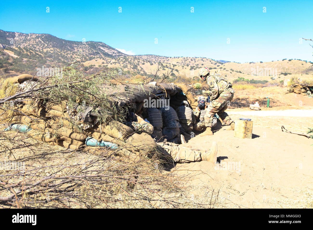 Alpha Company, 40th Expeditionary Signal Battalion conducts a live fire ...