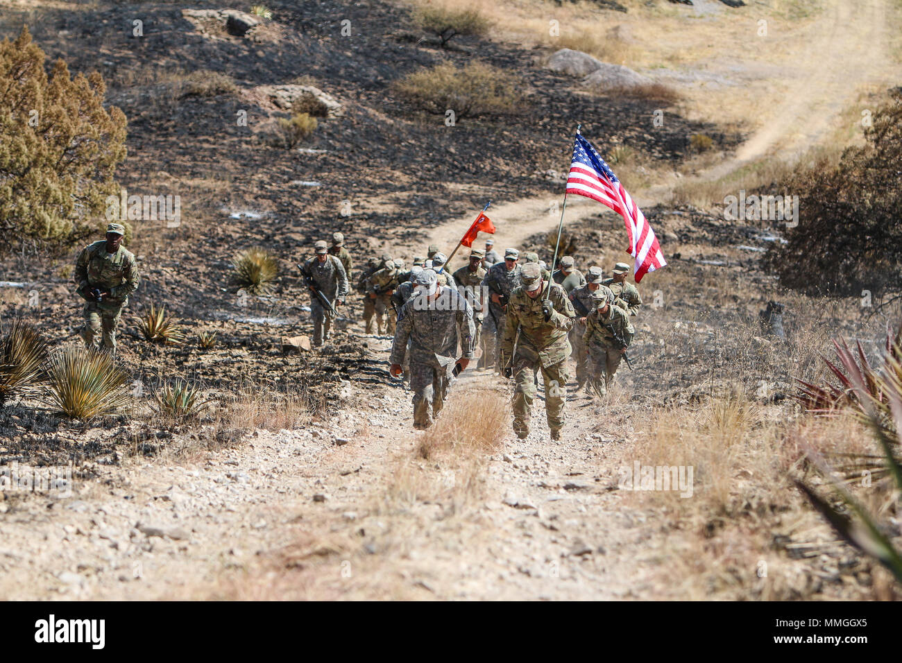 Alpha Company, 40th Expeditionary Signal Battalion conducts a live fire ...
