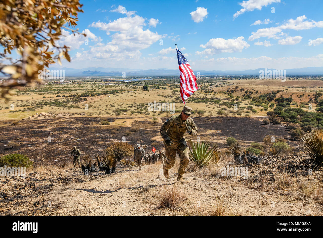 Alpha Company, 40th Expeditionary Signal Battalion conducts a live fire ...
