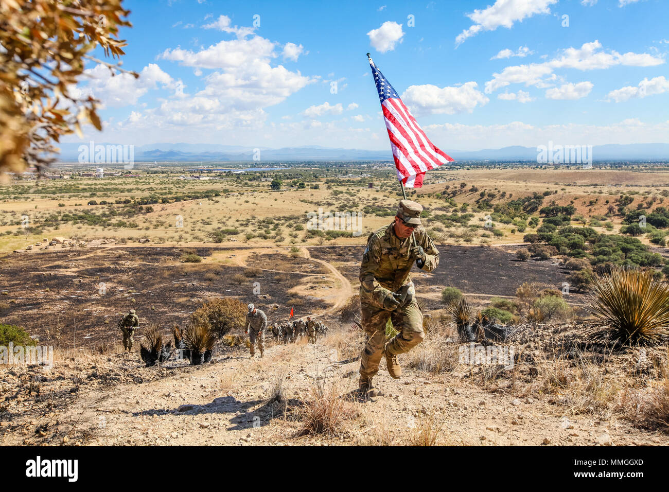 Alpha Company, 40th Expeditionary Signal Battalion conducts a live fire ...