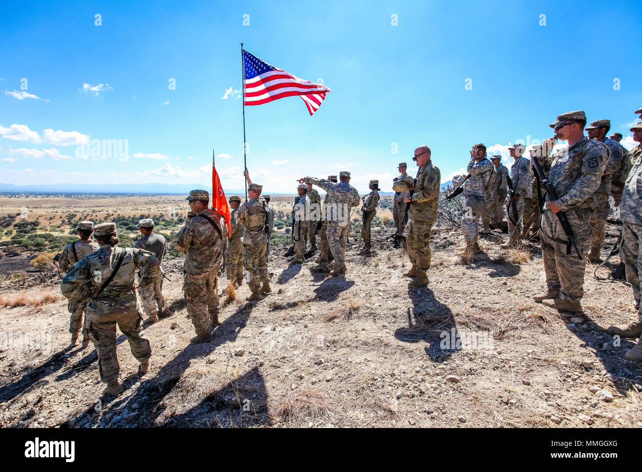 Alpha Company, 40th Expeditionary Signal Battalion conducts a live fire ...