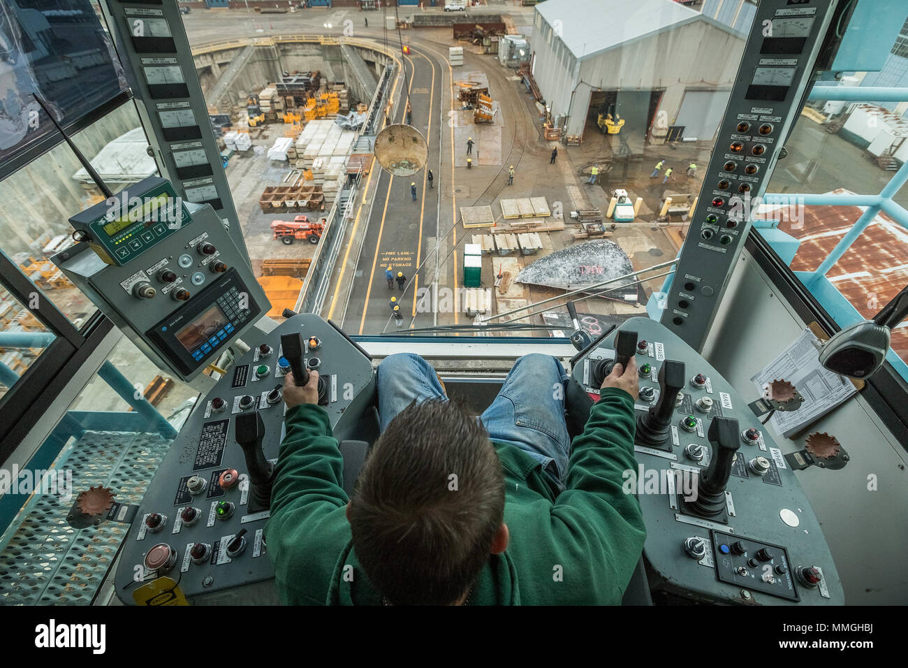 181116-N-CC918-001 BREMERTON, 10/26/2017-A crane operator waits for a ...