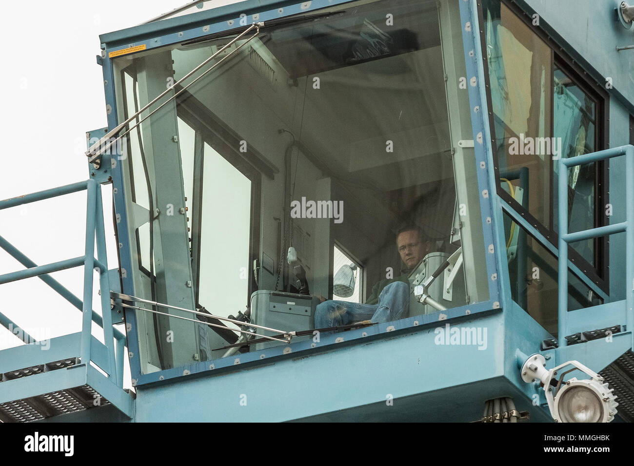 181116-N-CC918-002 BREMERTON, 10/26/2017-A crane operator watches for a ...