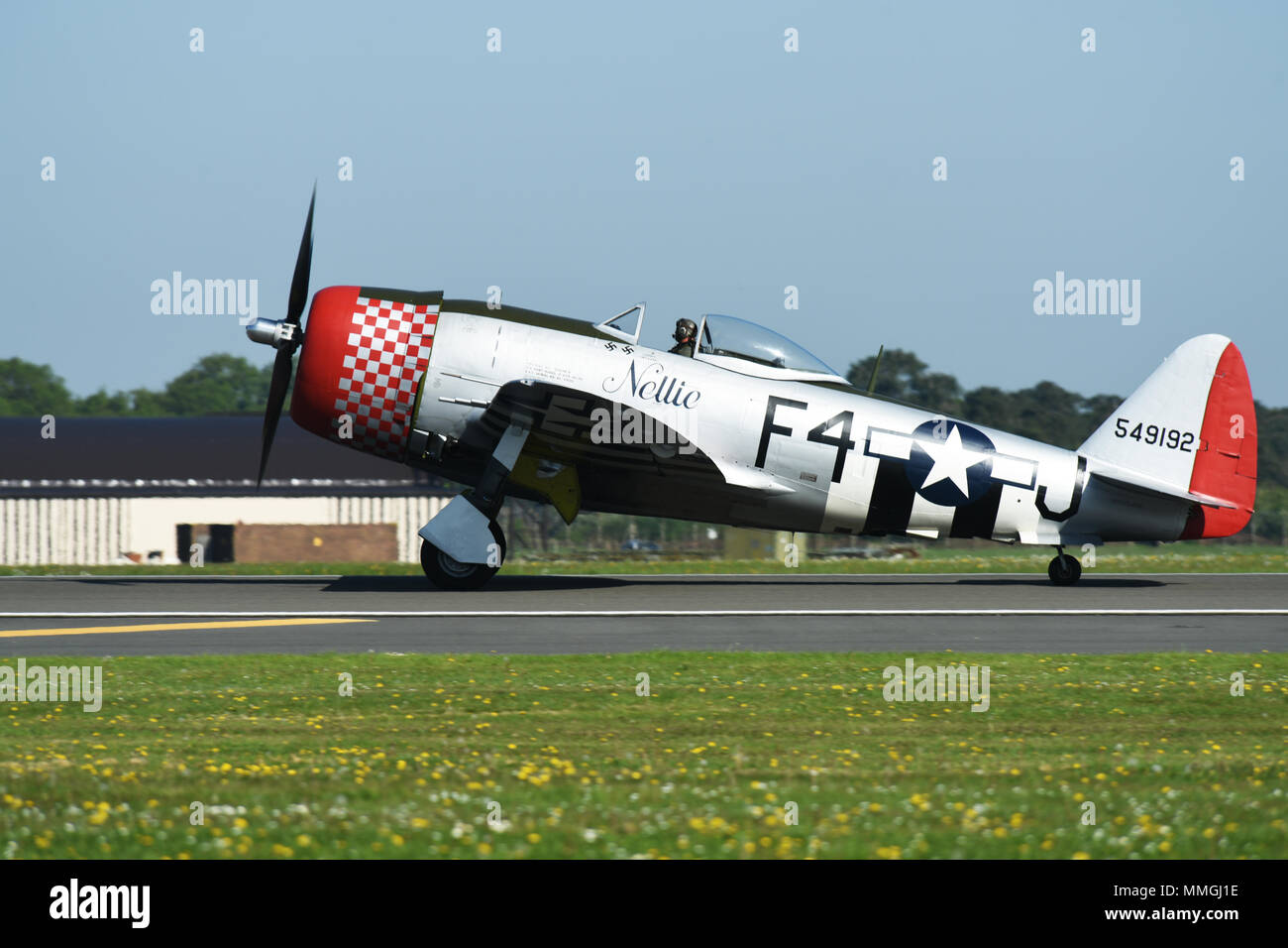 A P-47 Thunderbolt lands on the flightline at RAF Lakenheath, England ...
