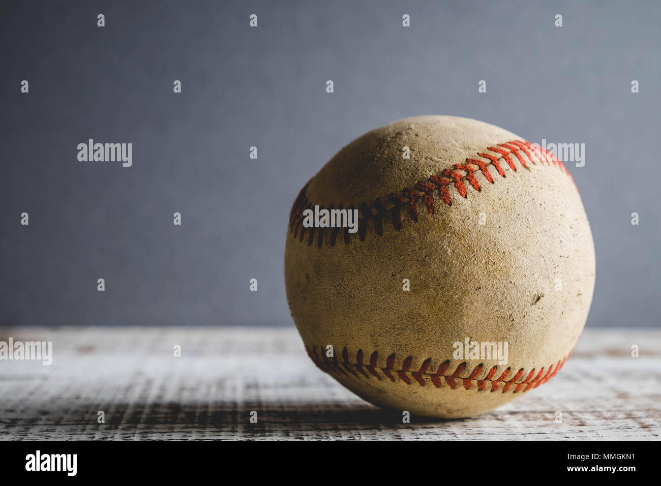 old Baseball and glove on wood background with filter effect retro ...