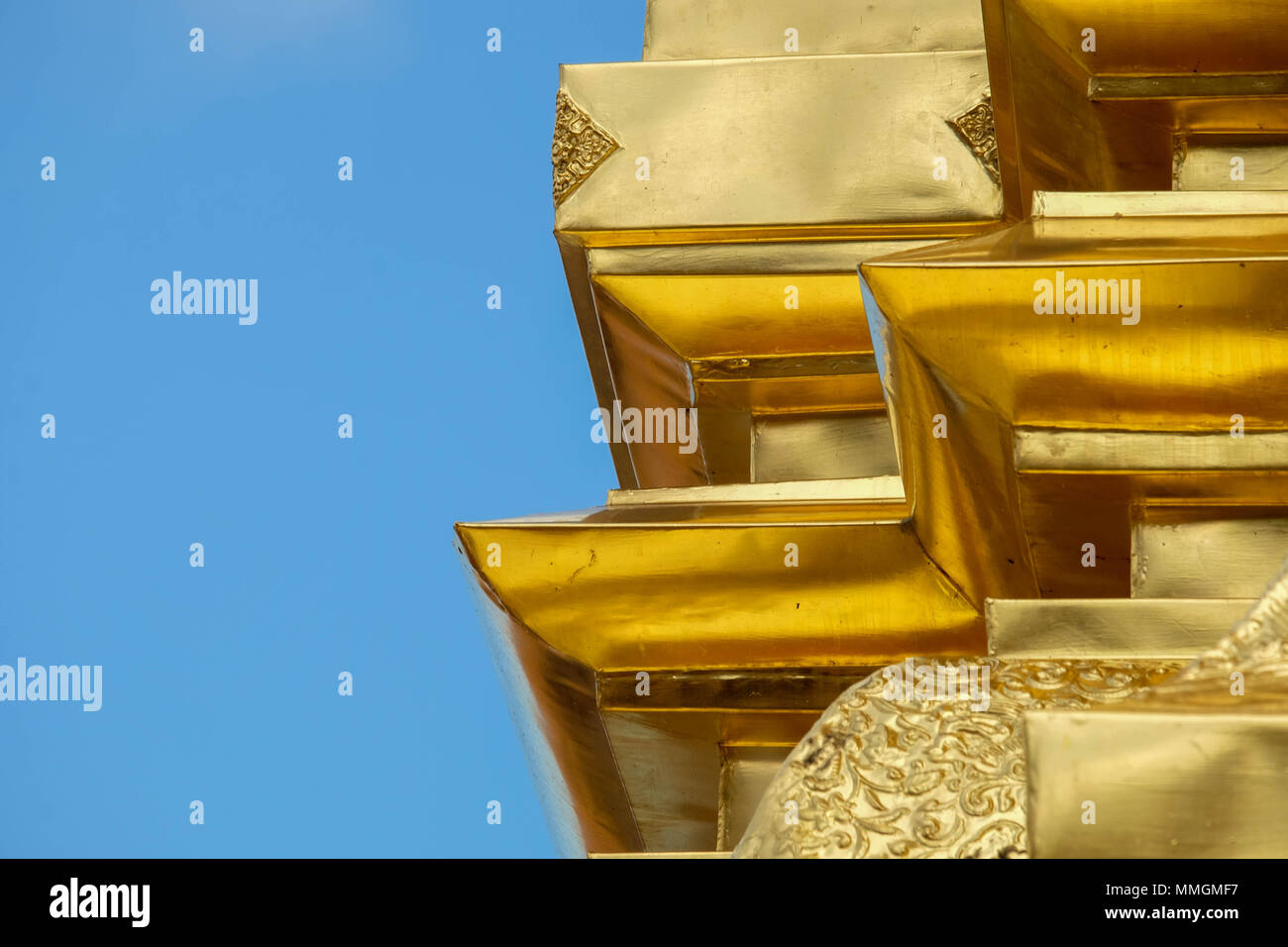 The gold stucco design of native thai style on the Wall Stock Photo - Alamy