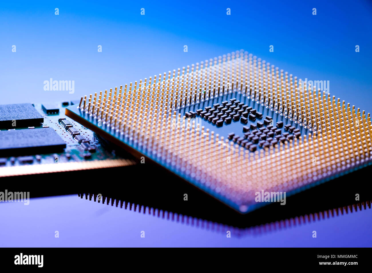 technology cyber electronic concept. cpu ram computer on blue light ...