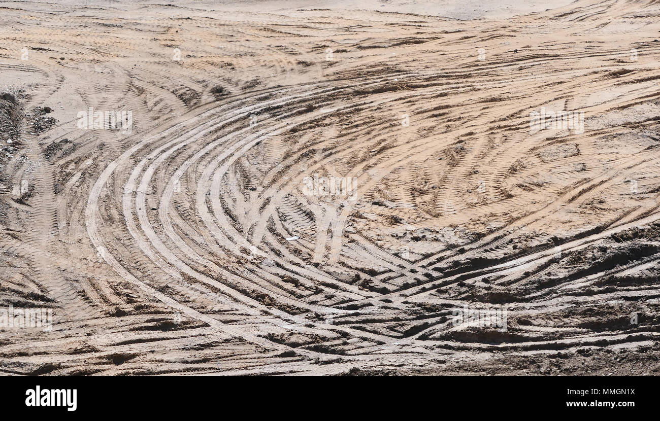 Wheel track mark on sand in construction site Stock Photo - Alamy