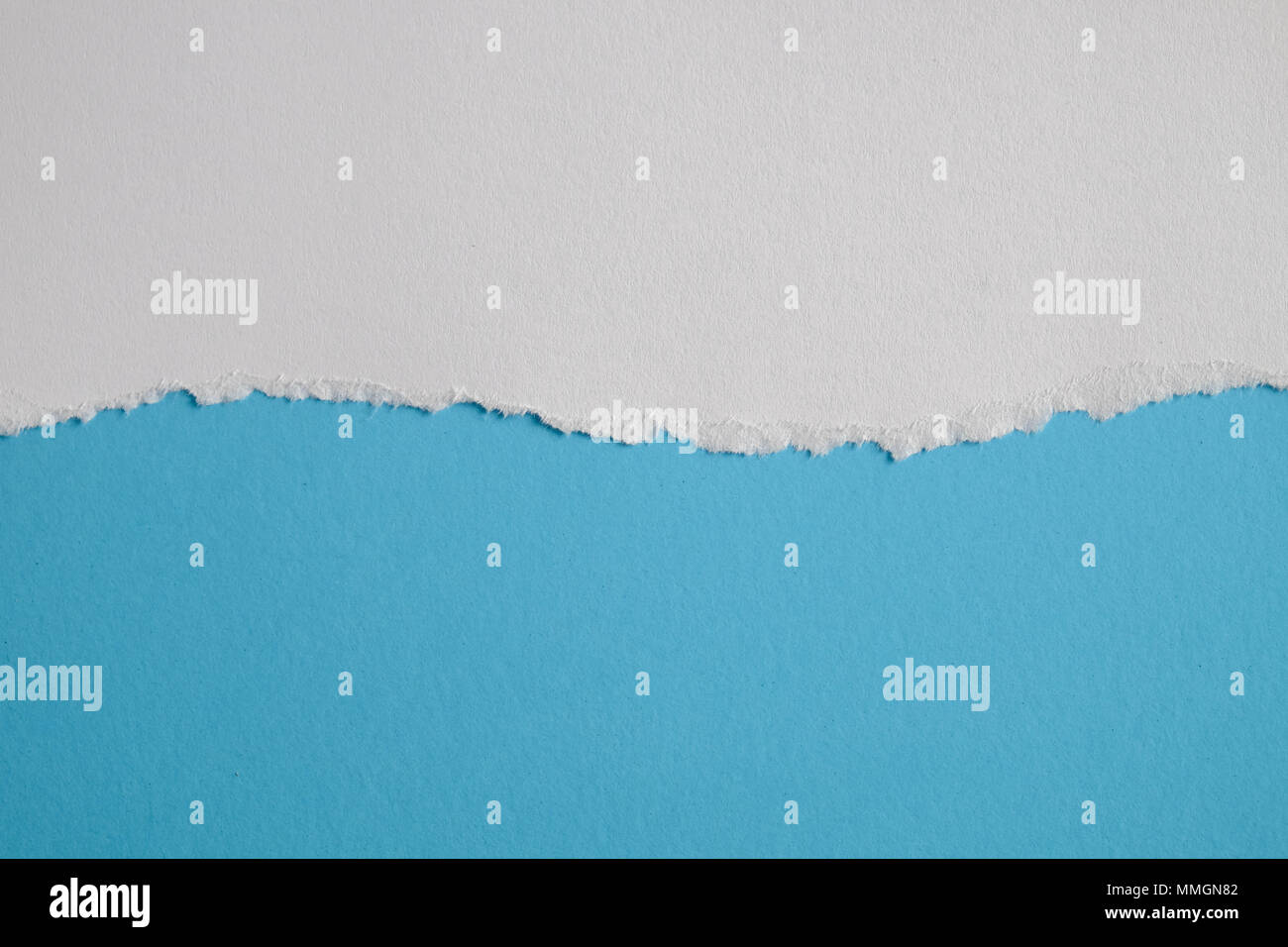 white torn paper with blue background, ready for design Stock Photo - Alamy